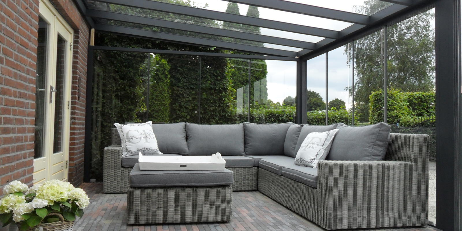 Wat kost een aluminium terrasoverkapping? - Slimster